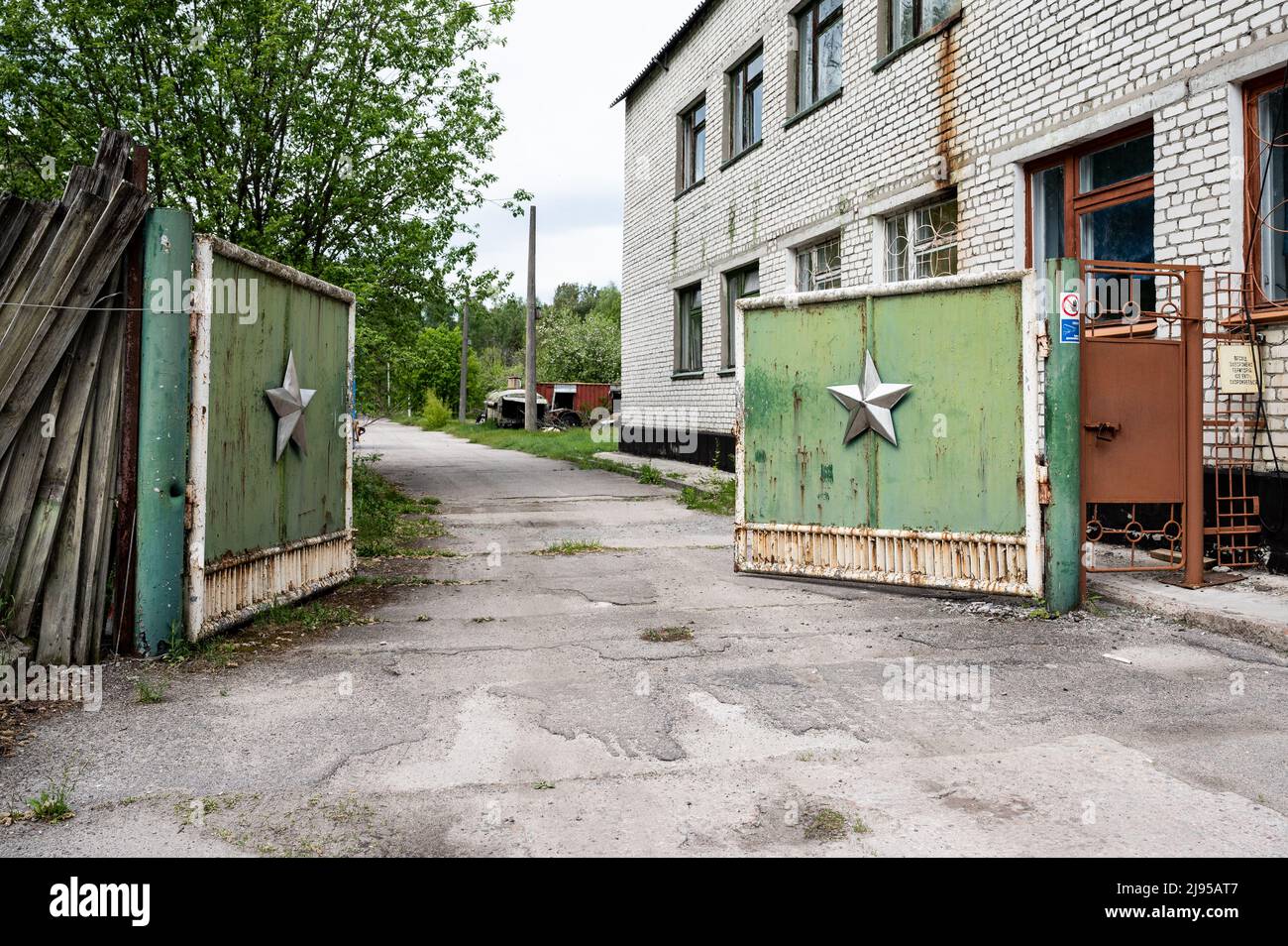 Chernobyl, Ukraine. 19th May, 2022. The entrance gate, with a Communist ...
