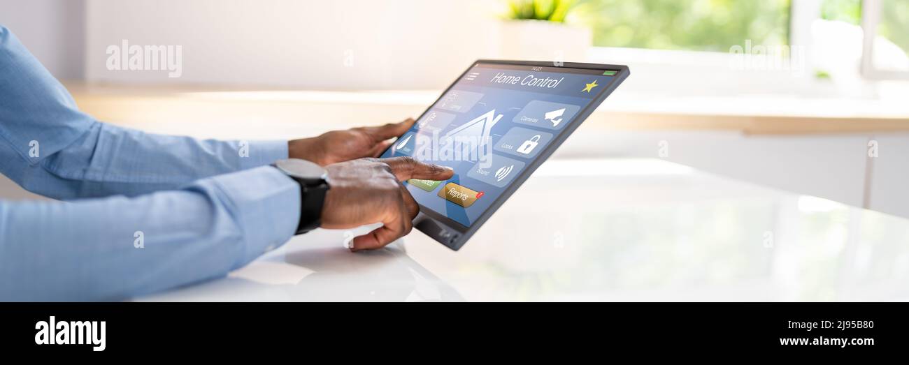 Close-up Of A Person's Hand Using Home Control System On Tablet Stock ...