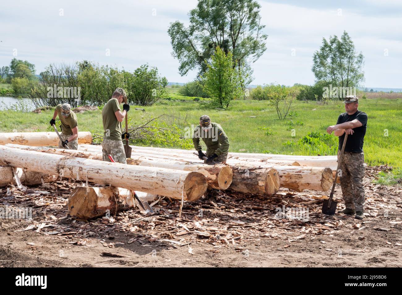 Ukrainian soldiers seen repairing a destroyed bridge over the Teteriv ...