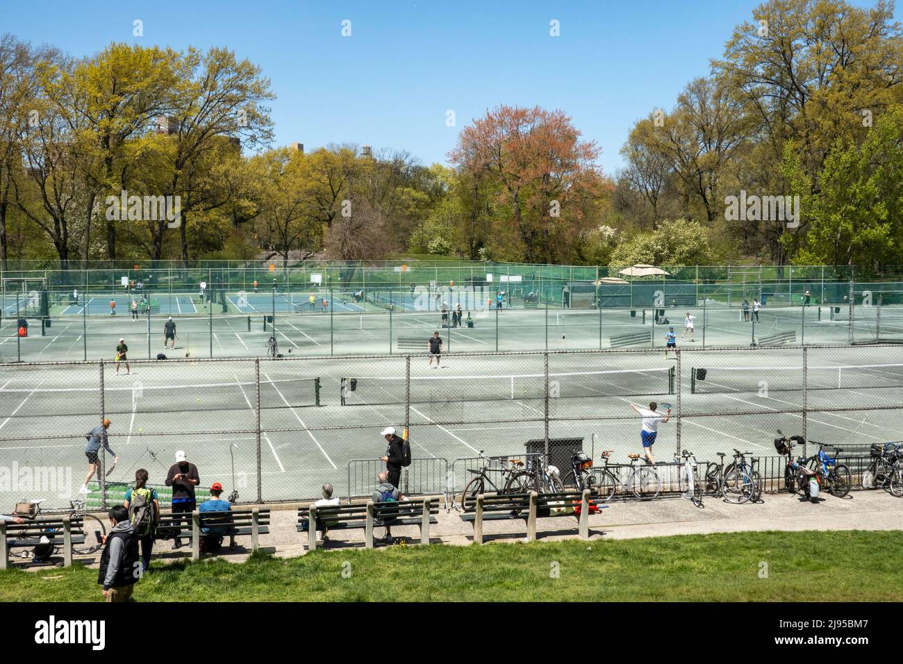 Players enjoying a spring afternoon at Central Park Tennis Center in ...