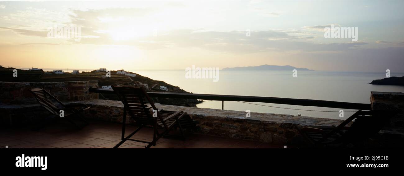 Sunset across Kini bay looking east towards Kea from terrace with ...