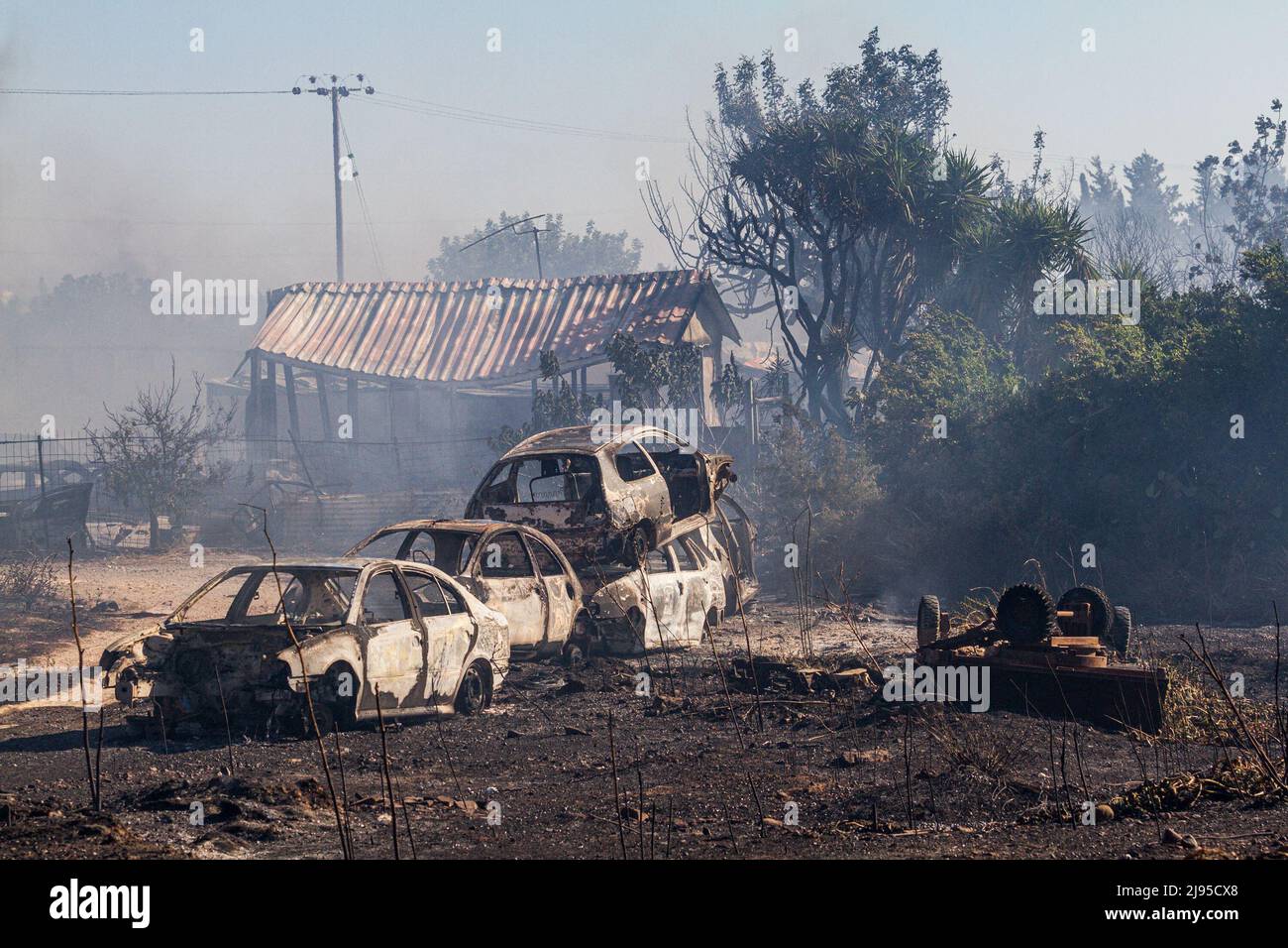 Burnt cars are seen after a fire, Limassol, Cyprus, on Jun. 2, 2021 ...