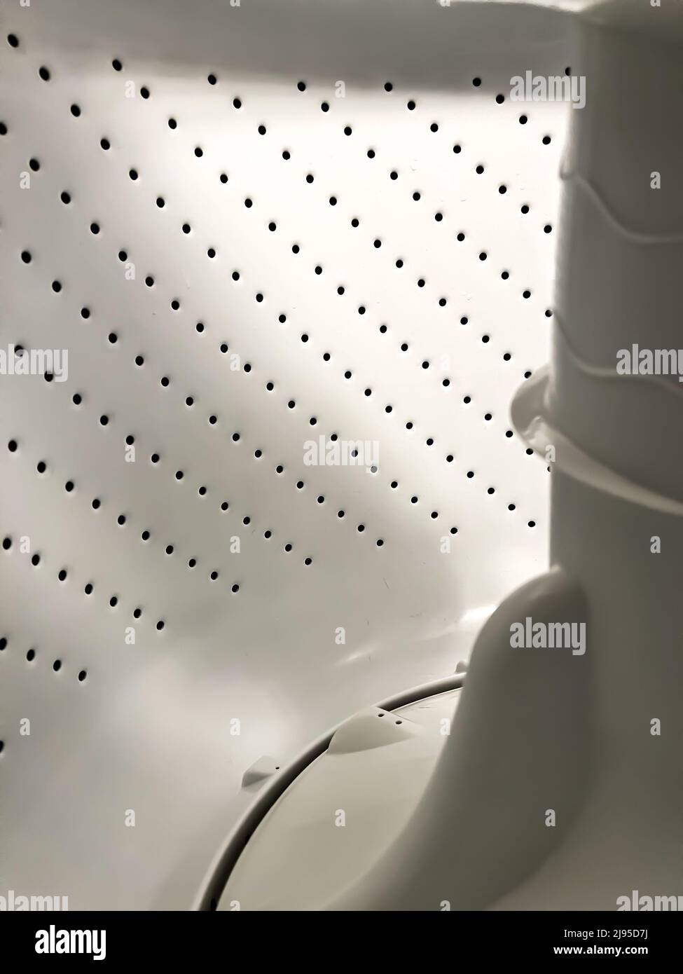 Inside view of a top loading laundry washing machine Stock Photo - Alamy