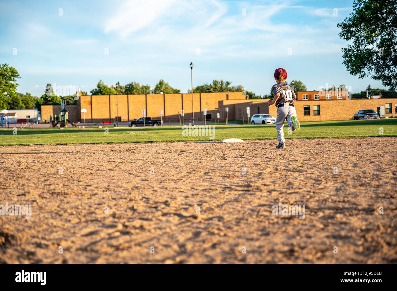 Boy baseball bat swing hi-res stock photography and images - Alamy