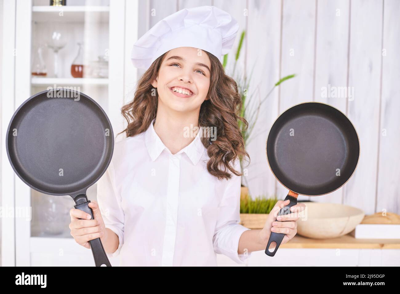 Adorable baby cook pan hi-res stock photography and images - Alamy