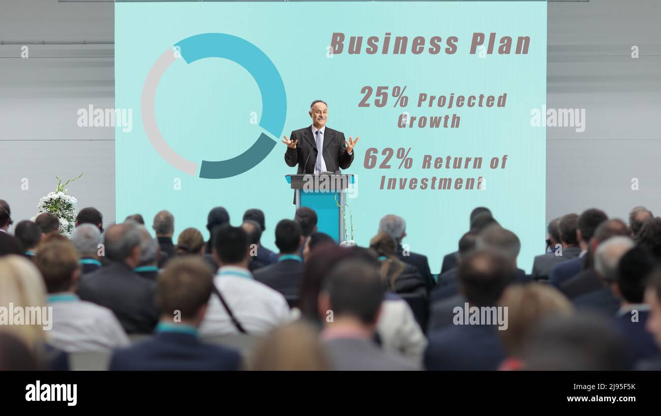 Businessman speaking at podium hi-res stock photography and images - Alamy