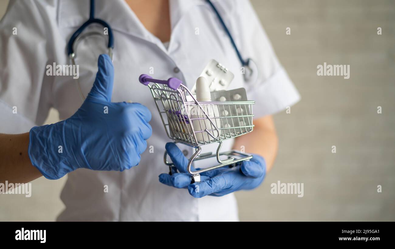 Woman shows pill hi-res stock photography and images - Alamy