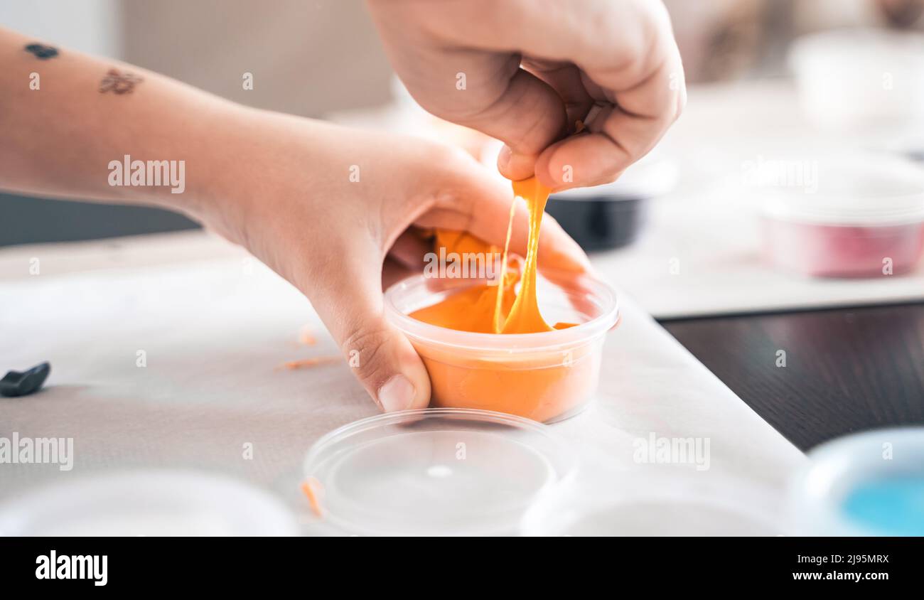 Little girls sculpt figurines crafts from air plasticine, modeling ...