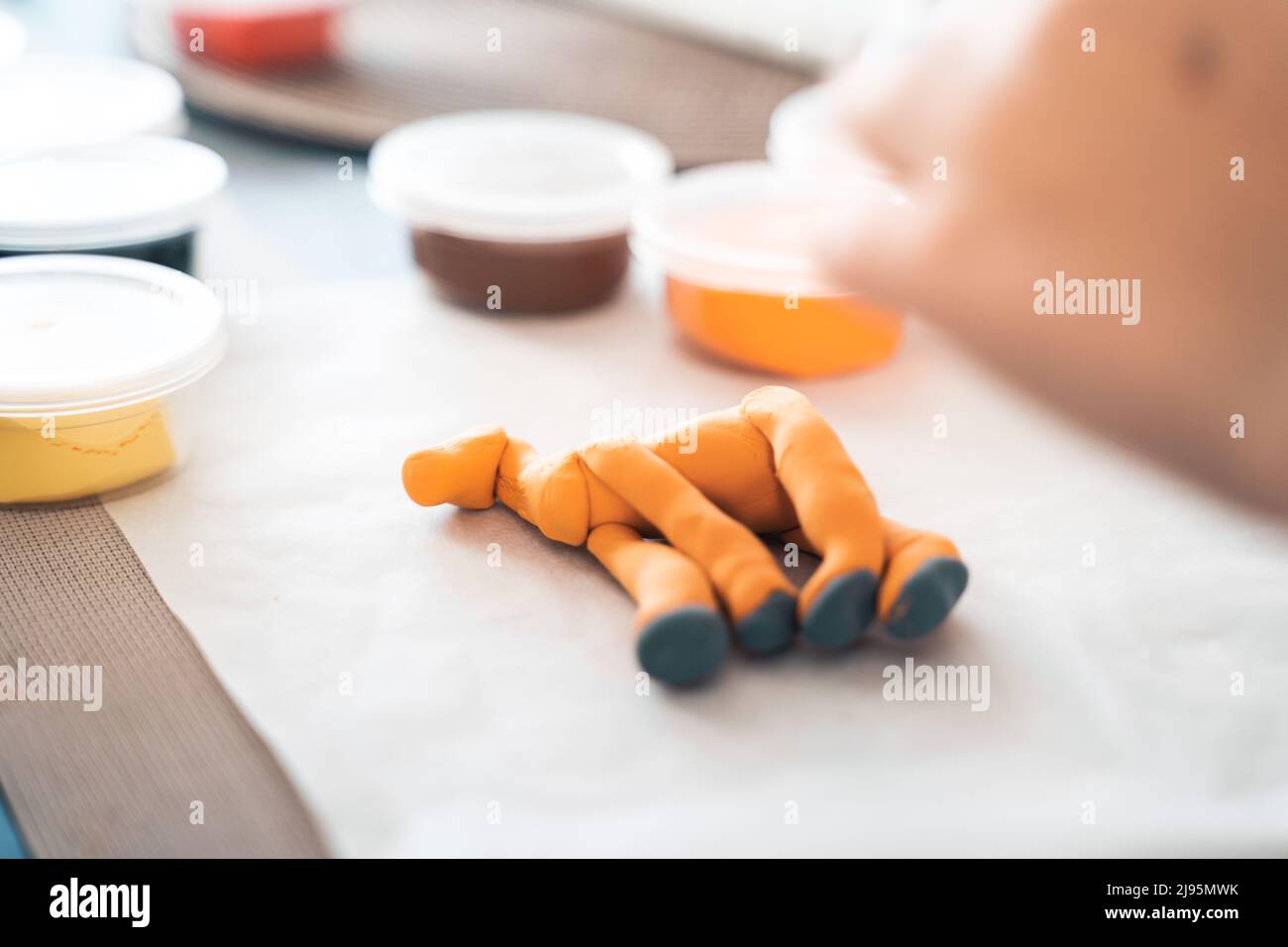 Little girls sculpt figurines crafts from air plasticine, modeling ...