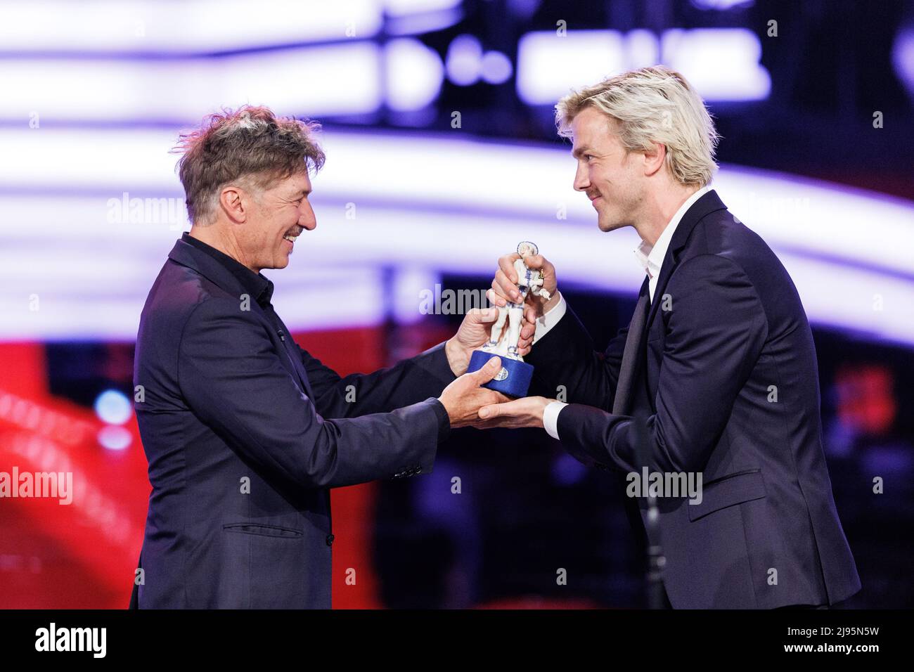 Munich, Germany. 20th May, 2022. Tobias Moretti (l), laudator, presents ...