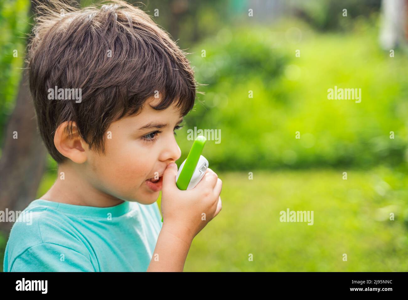 Small boy,kid,child play in walkie-talkie.Walkie Talkies with channels ...