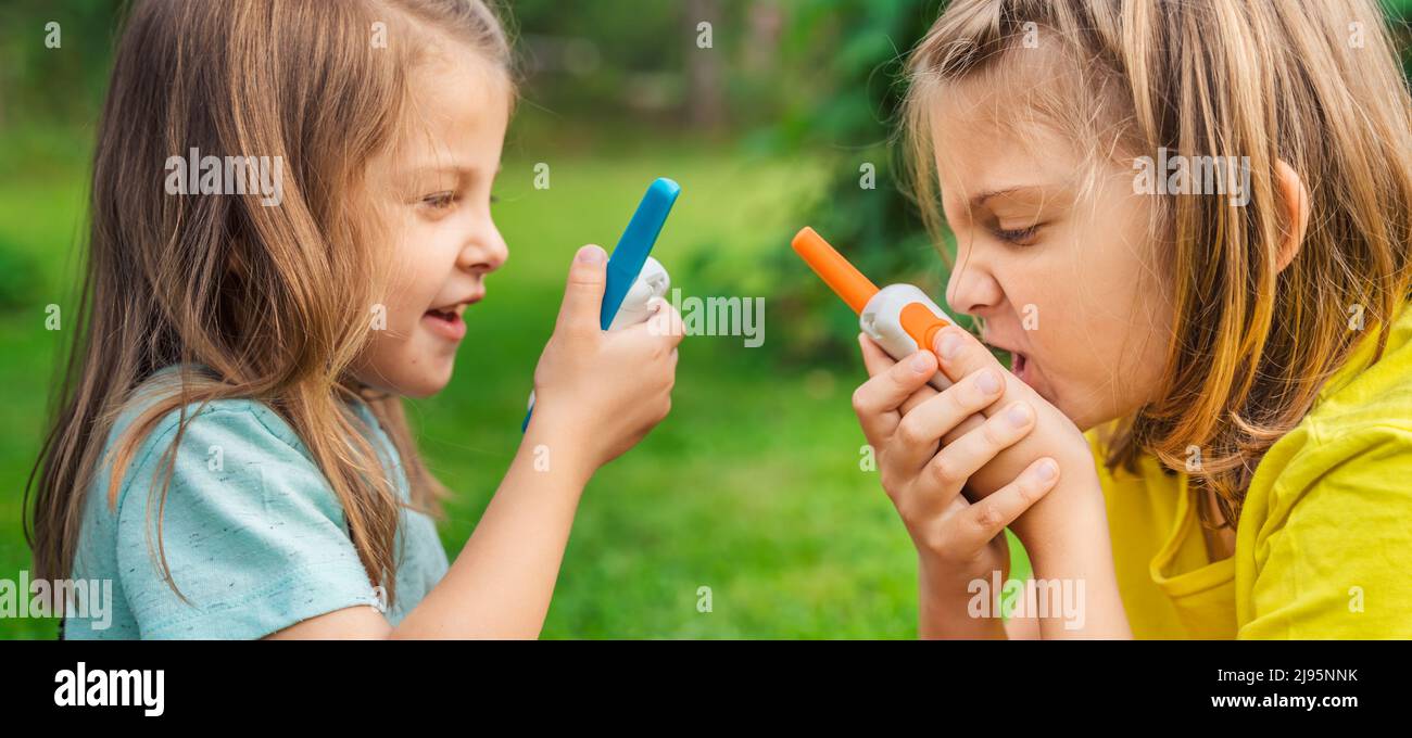 Small kids,girls play in walkie-talkie.Walkie Talkies with channels ...