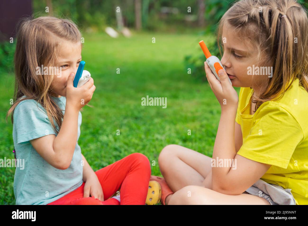 Small kids,girls play in walkie-talkie.Walkie Talkies with channels ...