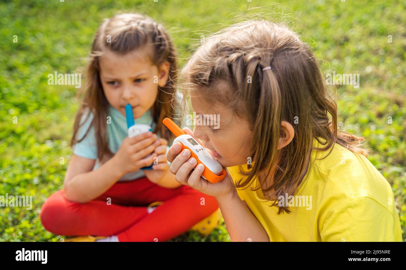 Small kids,girls play in walkie-talkie.Walkie Talkies with channels ...