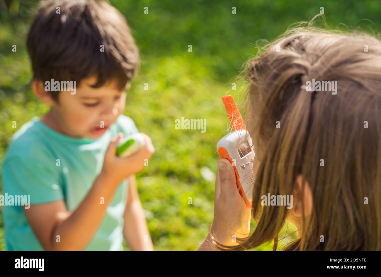 Small kids,girls play in walkie-talkie.Walkie Talkies with channels ...