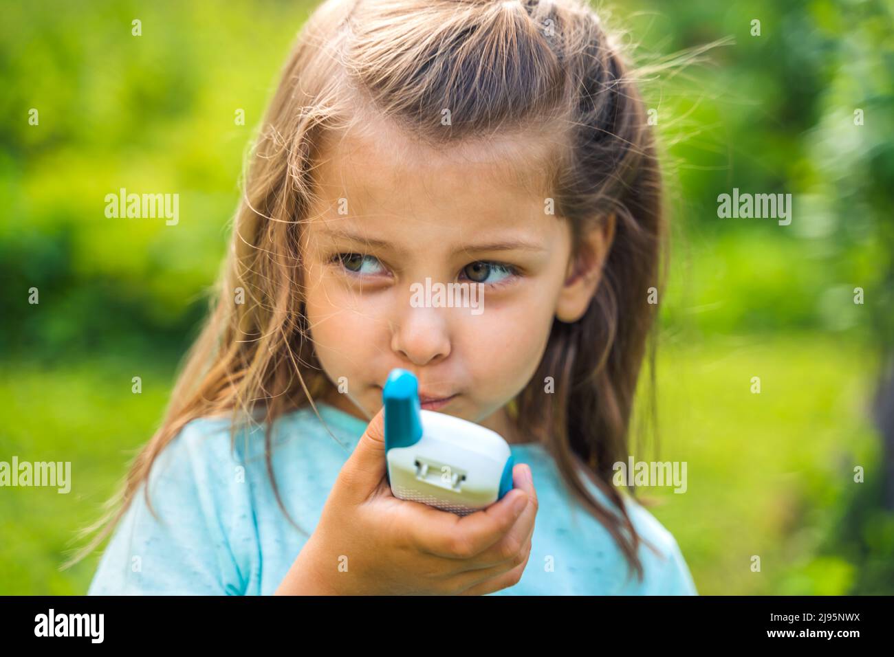 Small girl,kid play in walkie-talkie.Walkie Talkies with channels.Game ...