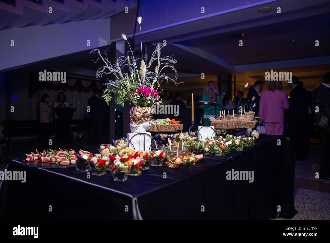 Snacks in plastic cups on the buffet at the event Stock Photo - Alamy