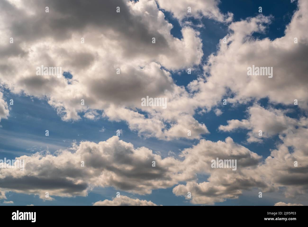 Blue sky background with white striped clouds in heaven and infinity ...