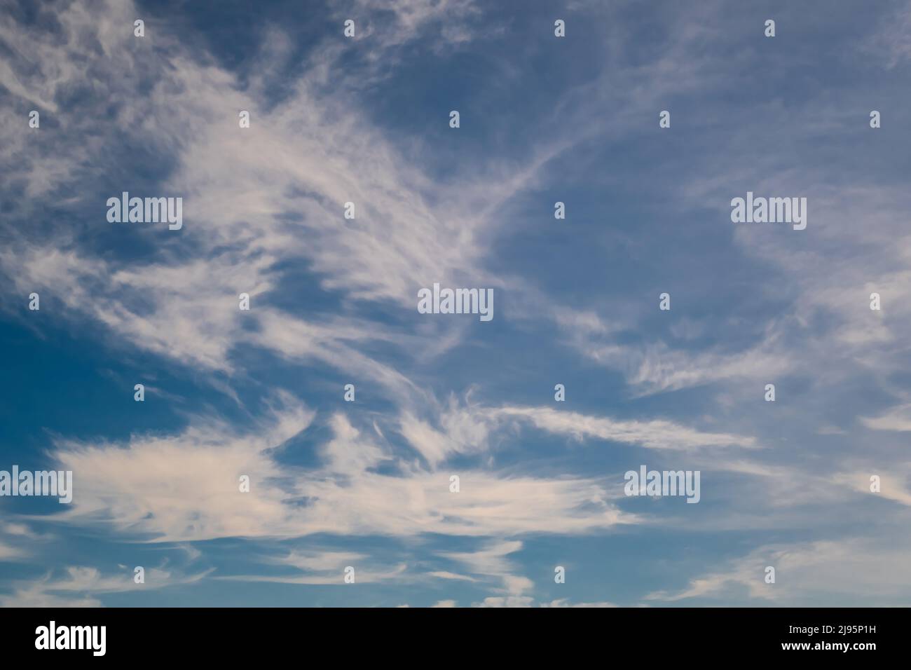 Blue sky background with white striped clouds in heaven and infinity ...