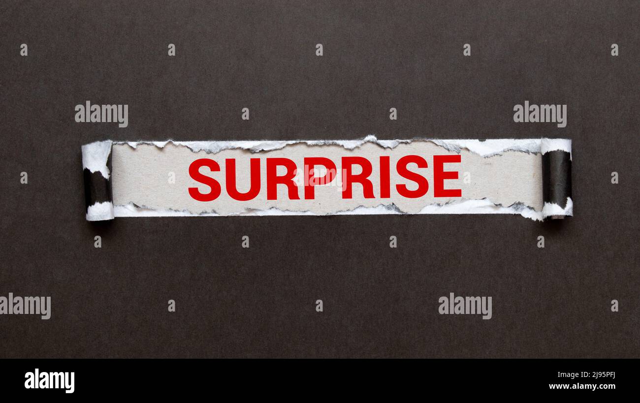 Red broken paper background with the word SURPRISE. Concept emotion ...