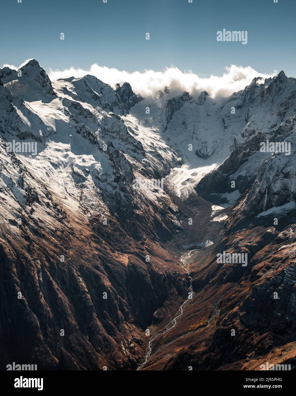 Snowy winter mountains with valley in Caucasus region in Russia Stock ...