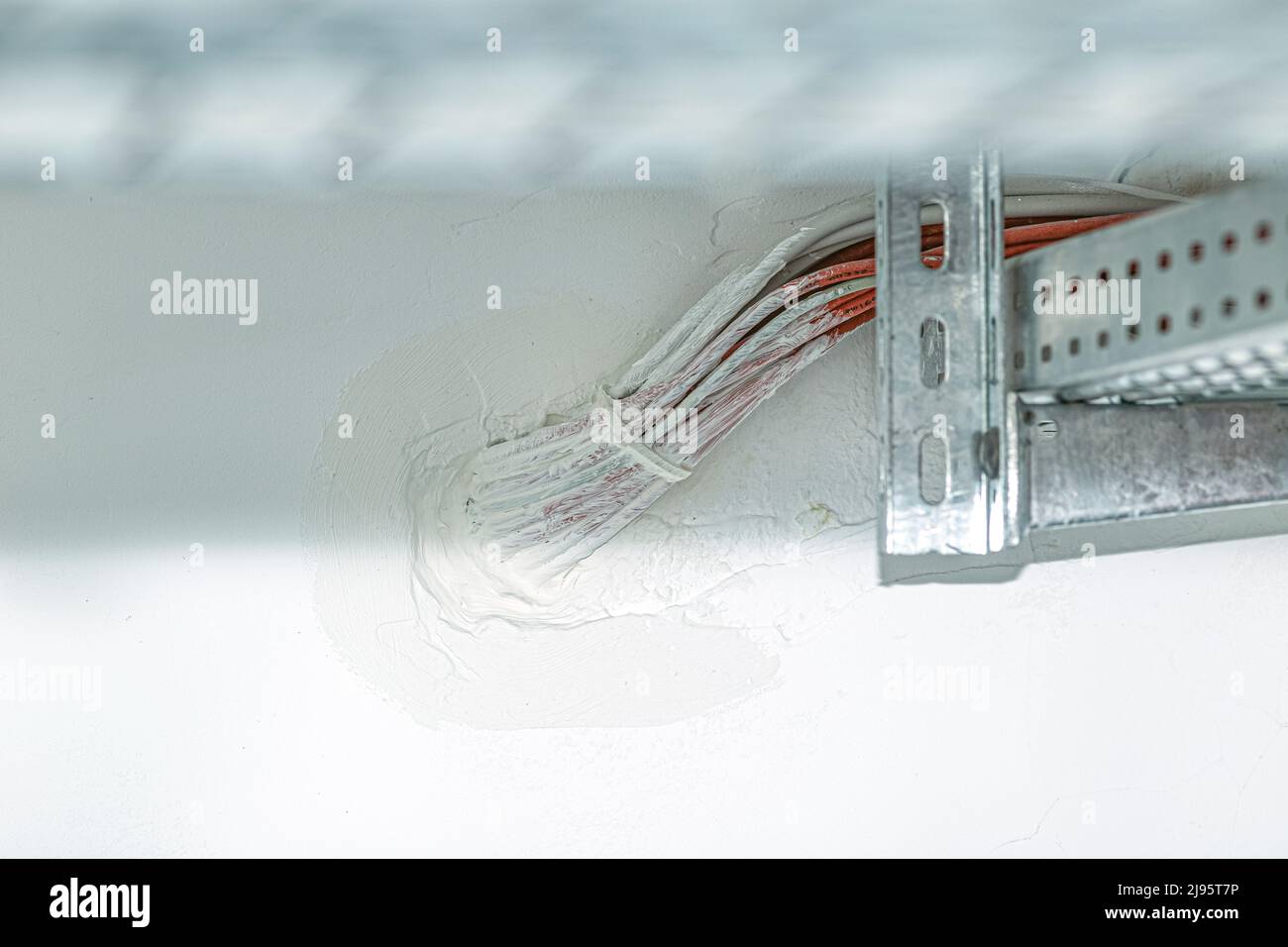 Fire barrier in a wall with cable duct Stock Photo - Alamy