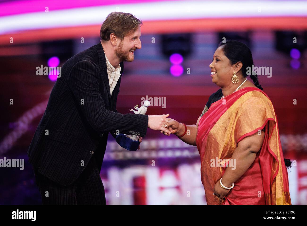 Munich, Germany. 20th May, 2022. Chanchala Mondal (r) presents Michael ...