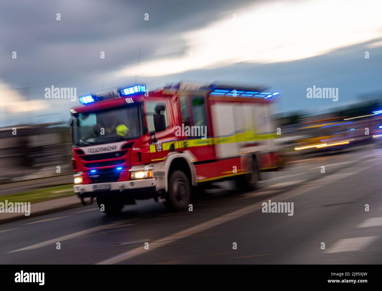 Paderborn, Germany. 20th May, 2022. A fire department vehicle drives ...
