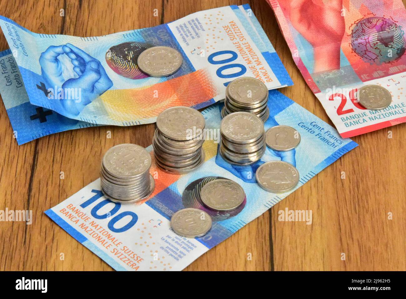 swiss money francs coins and banknotes Stock Photo - Alamy