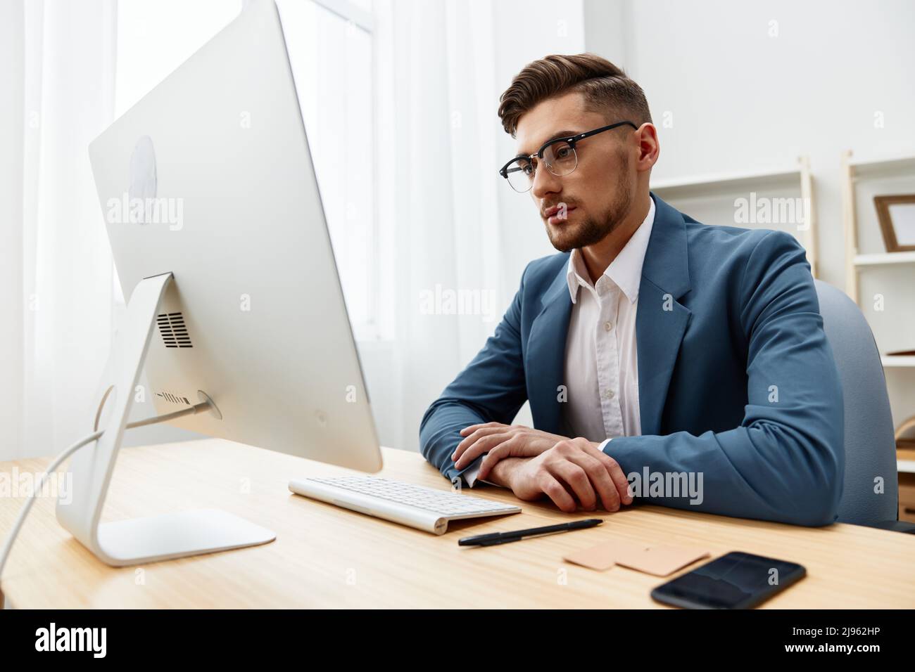 businessmen at the desk in the office an official isolated background ...