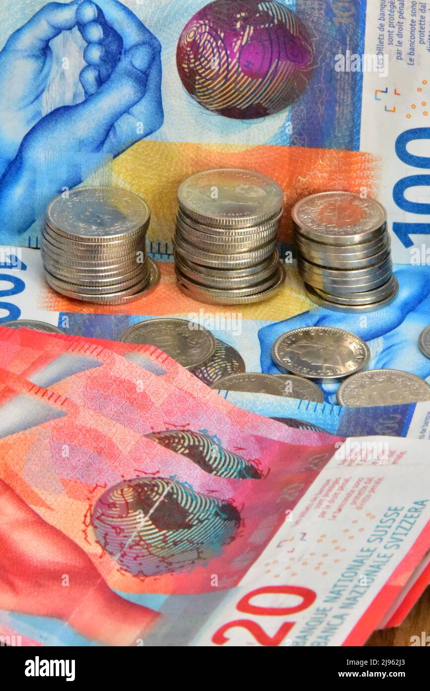 swiss money francs coins and banknotes Stock Photo - Alamy