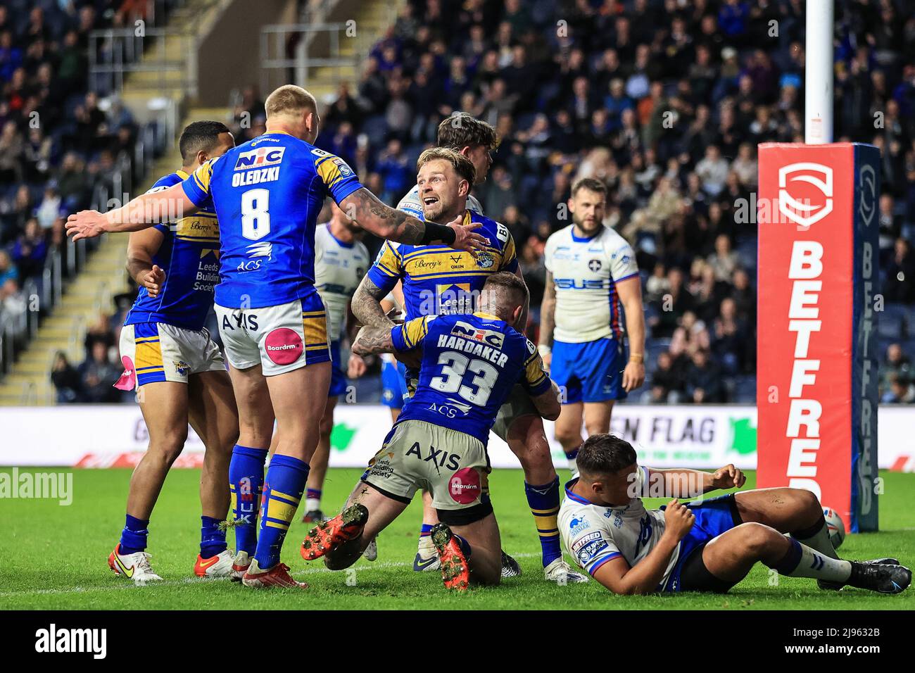 Blake Austin of Leeds Rhinos celebrates his try with team mates Stock ...