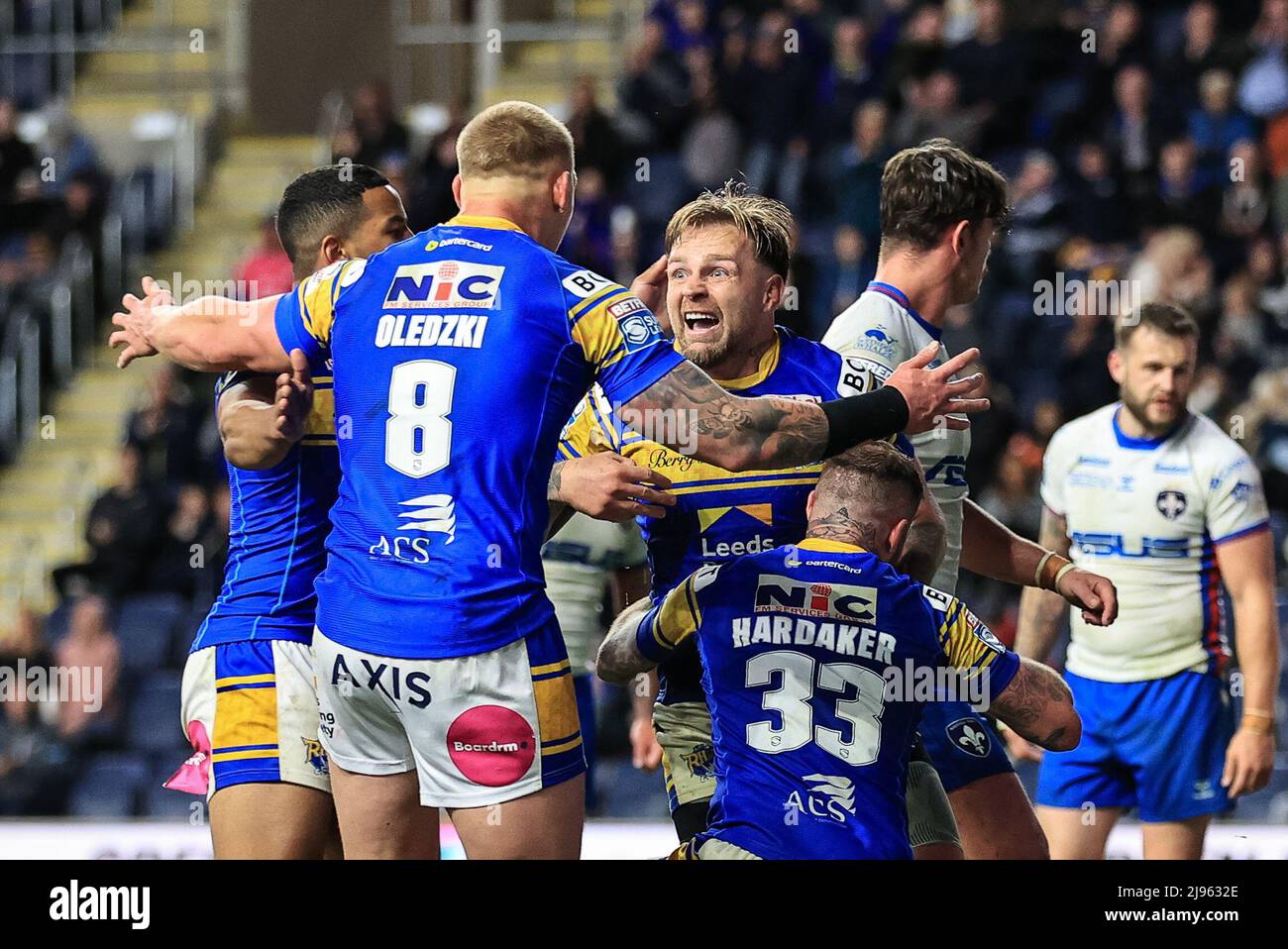 Blake Austin of Leeds Rhinos celebrates his try with team mates Stock ...