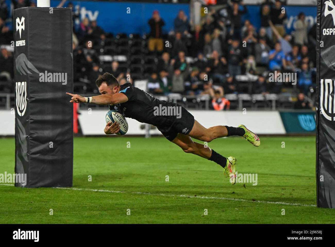 Luke Morgan of Ospreys goes over for a try Stock Photo - Alamy