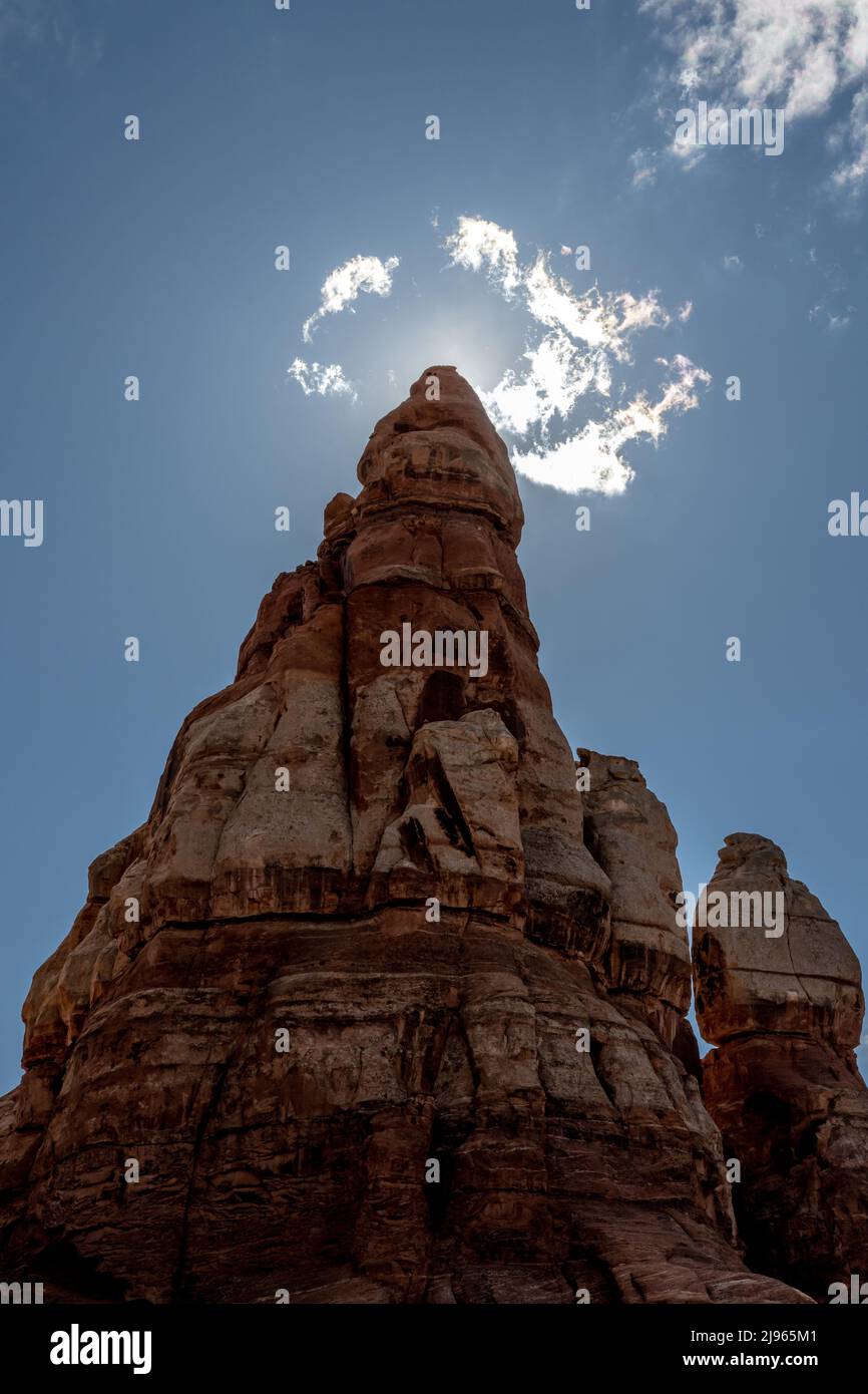 Crown Of Clouds Glows Around The Top of A Spire In The Needles in ...