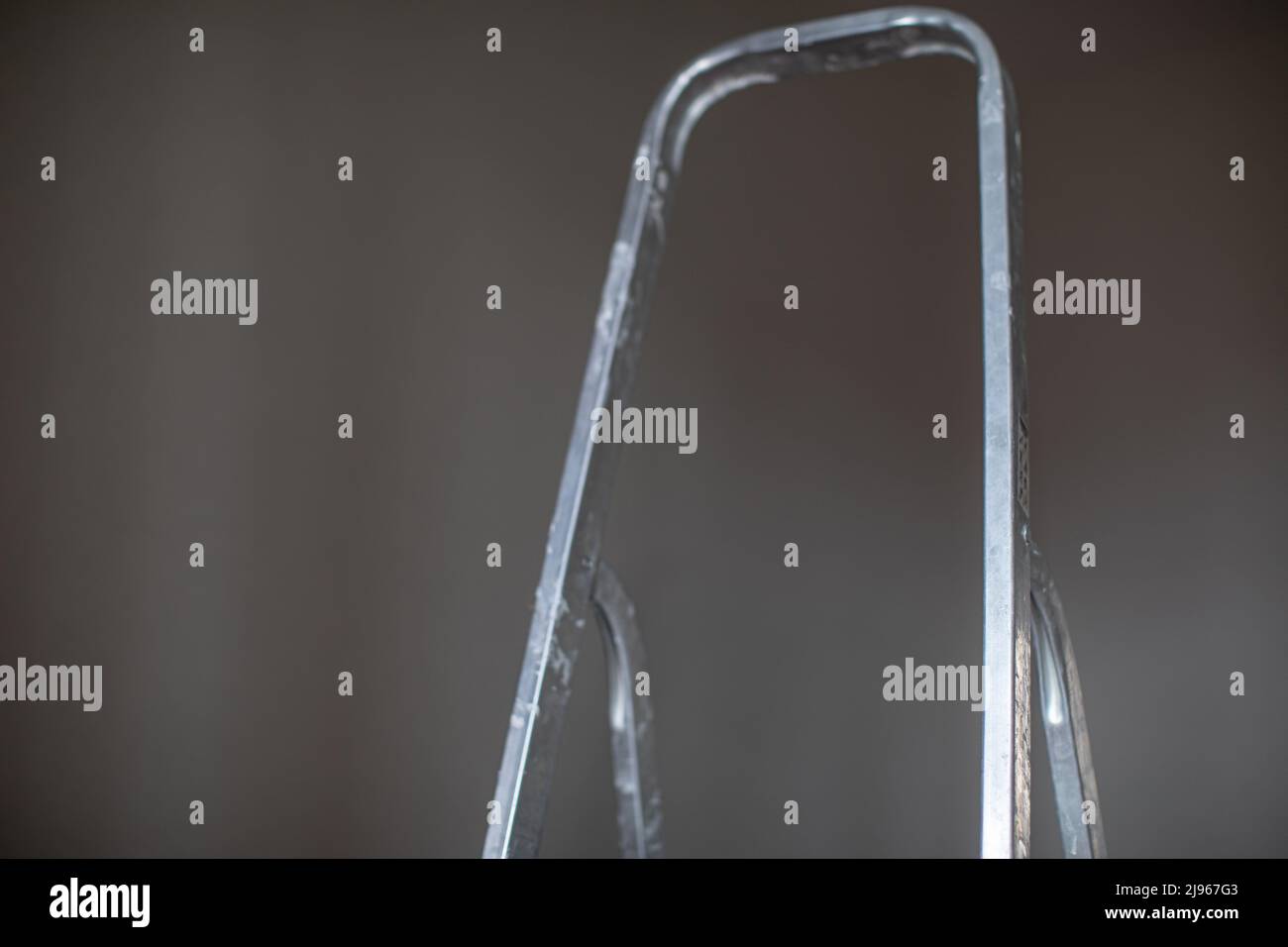 The top half of an aluminium ladder Stock Photo - Alamy