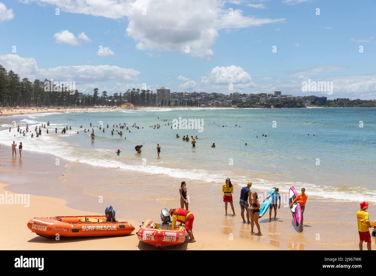 Surf rescue boats red zodiac, on Manly Beach with surf life savers ...