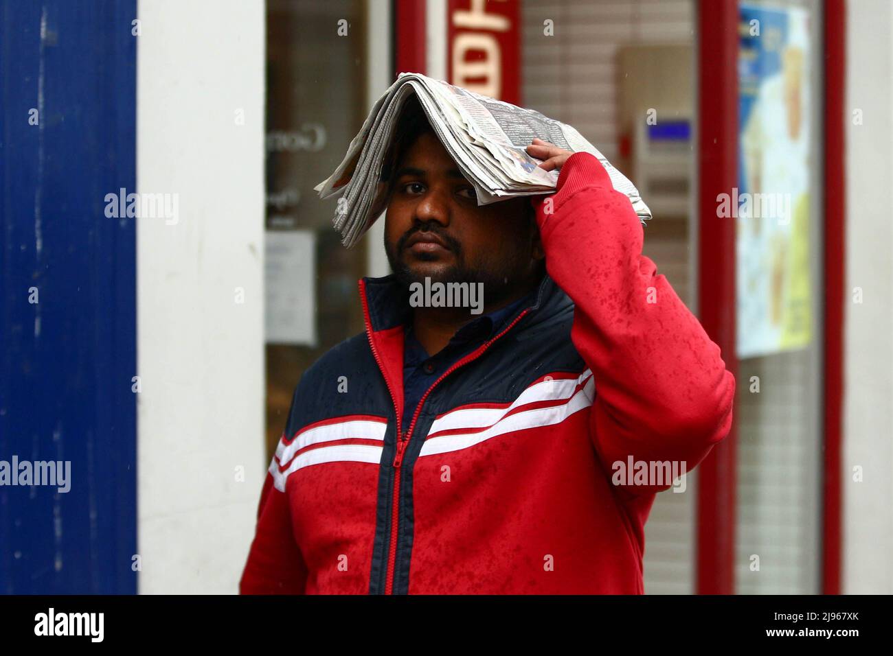 Rain head newspaper hi-res stock photography and images - Alamy