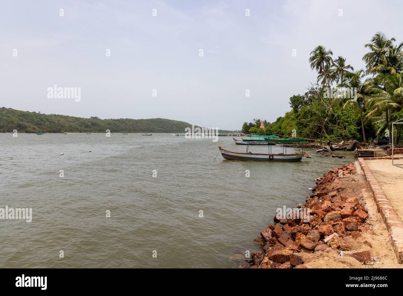Boats anchored on Karli River for tourists as seen from Rivercoast ...