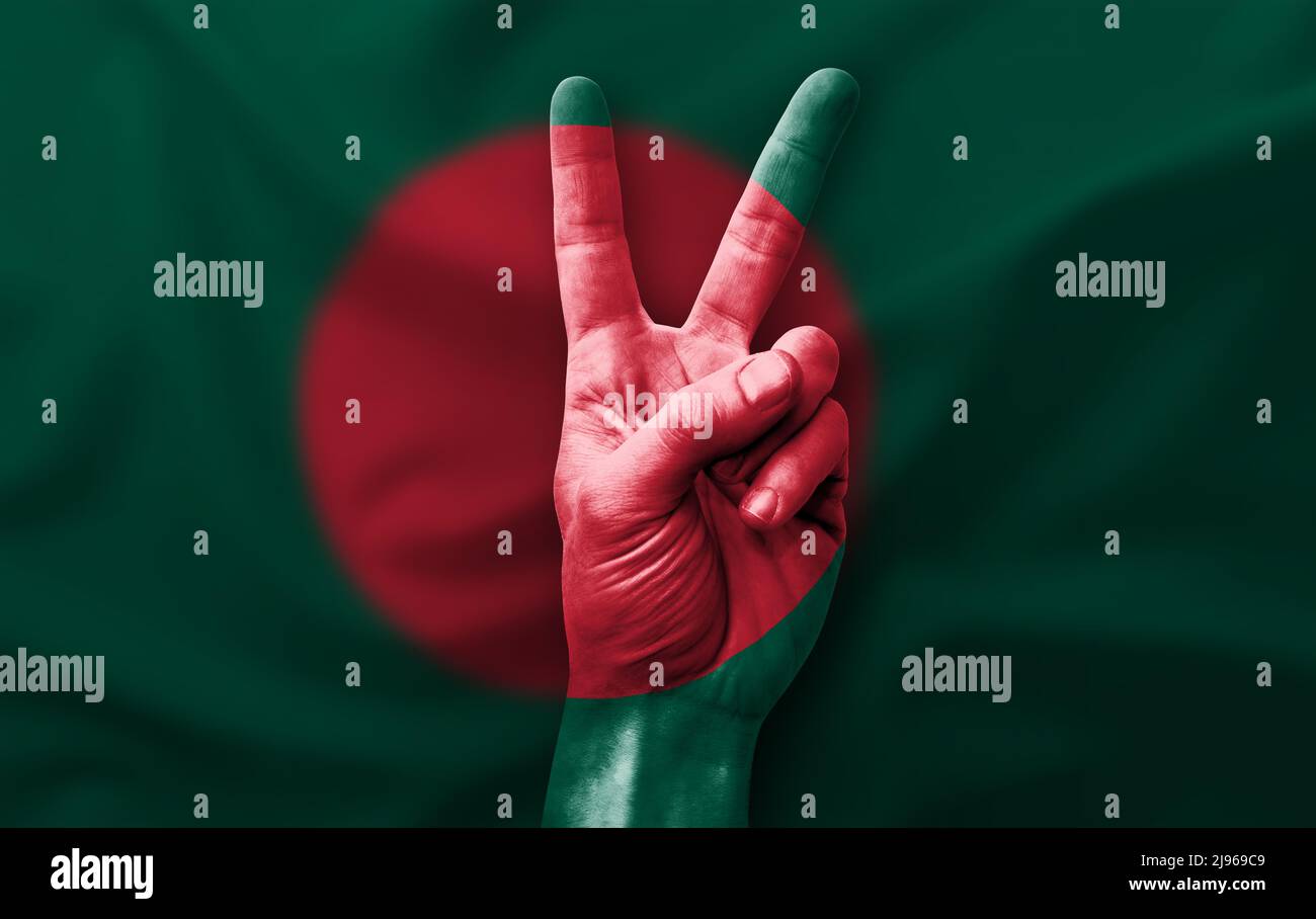 Hand making the V victory sign with flag of bangladesh Stock Photo - Alamy