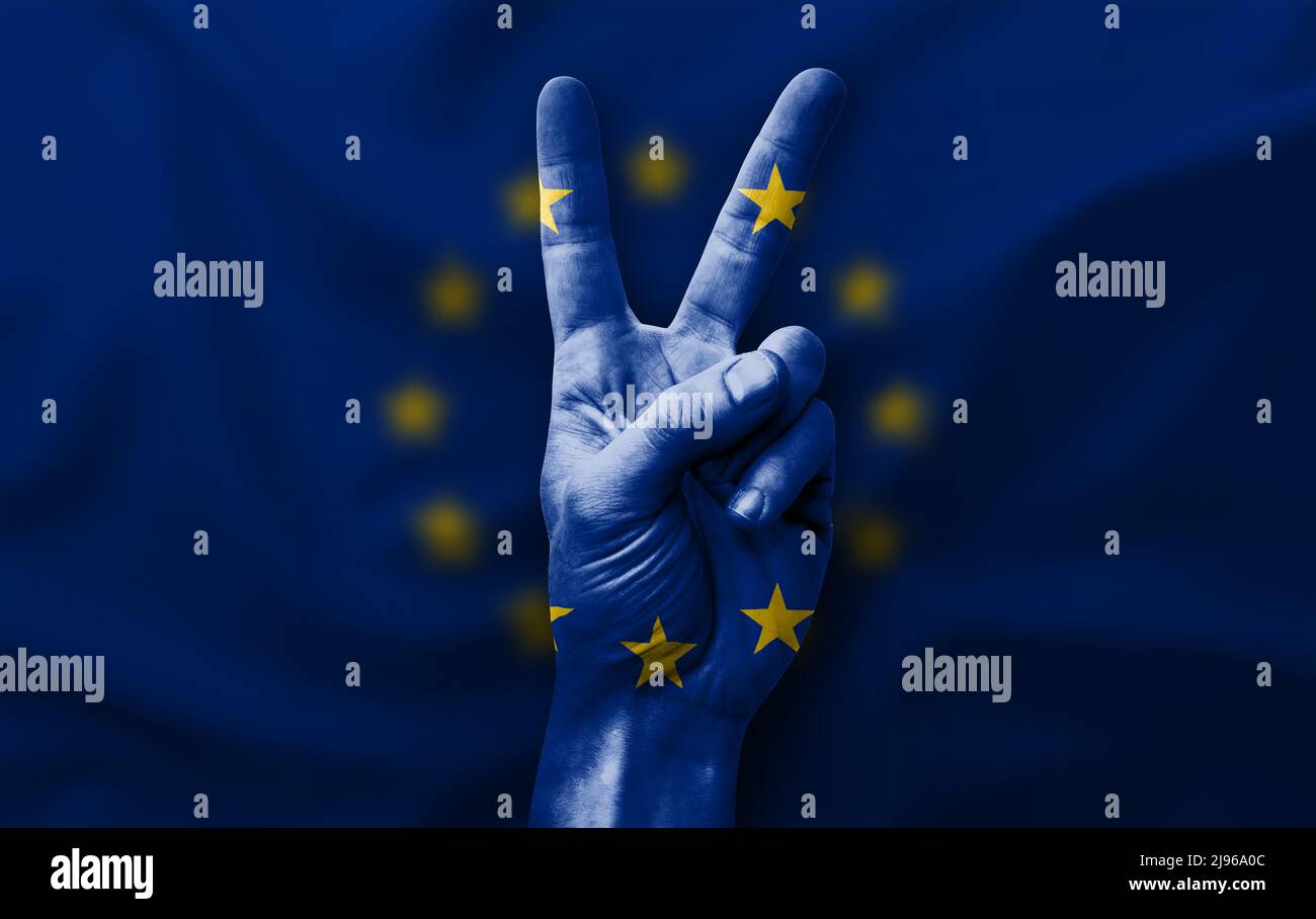 Hand making the V victory sign with flag of european union Stock Photo ...