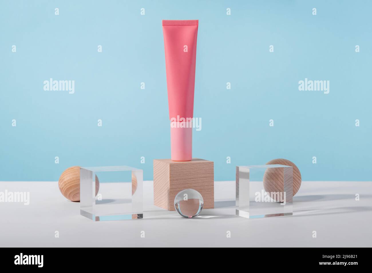 Medical skincare and cosmetic cream mockup on acrylic block pedestal ...