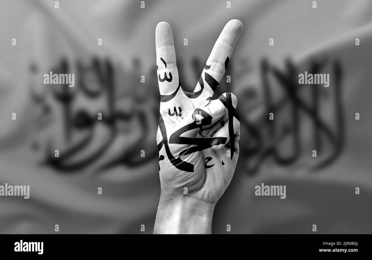 Hand making the V victory sign with flag of afghanistan Stock Photo - Alamy