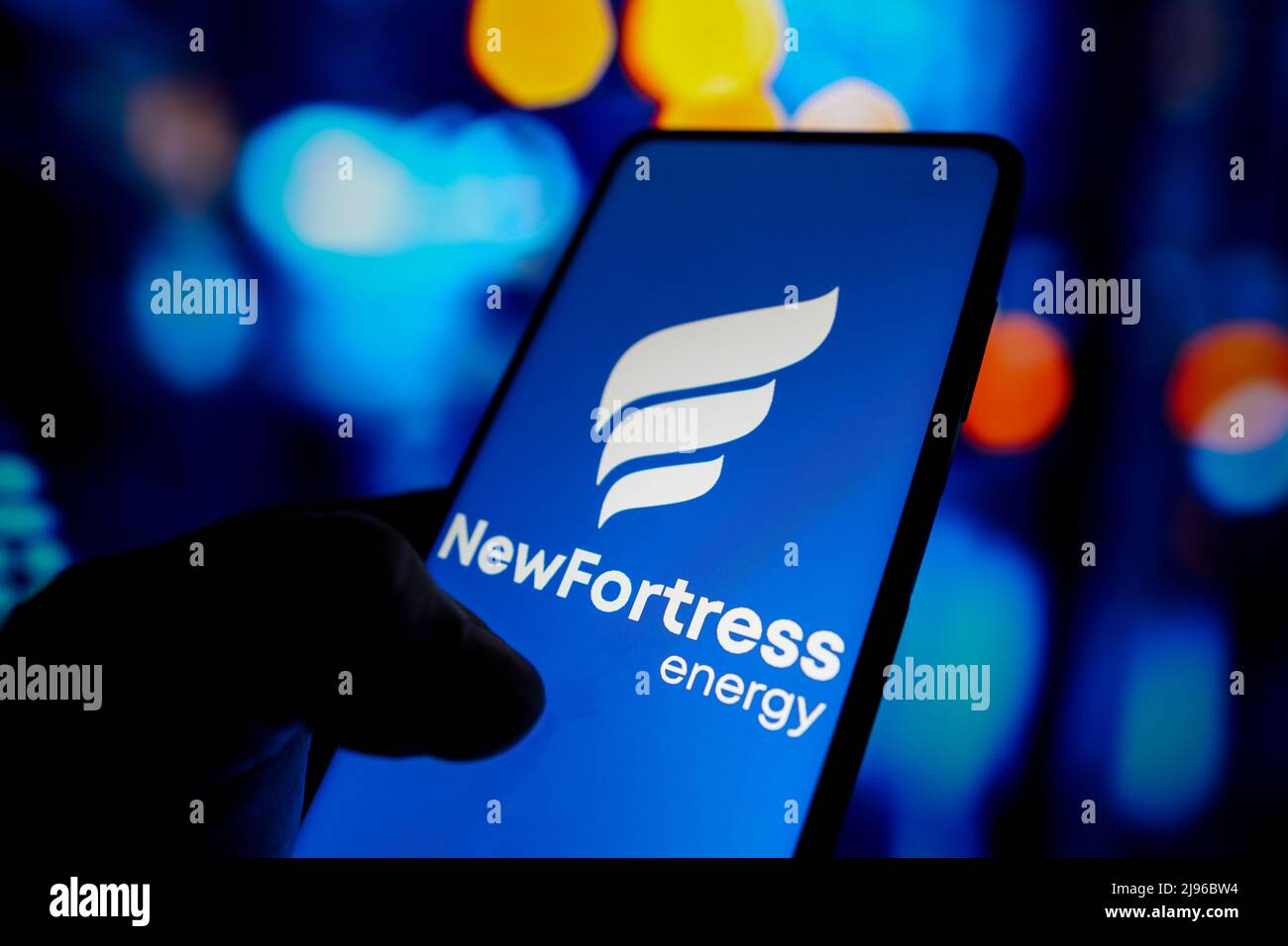 In this photo illustration, the New Fortress Energy logo seen displayed ...