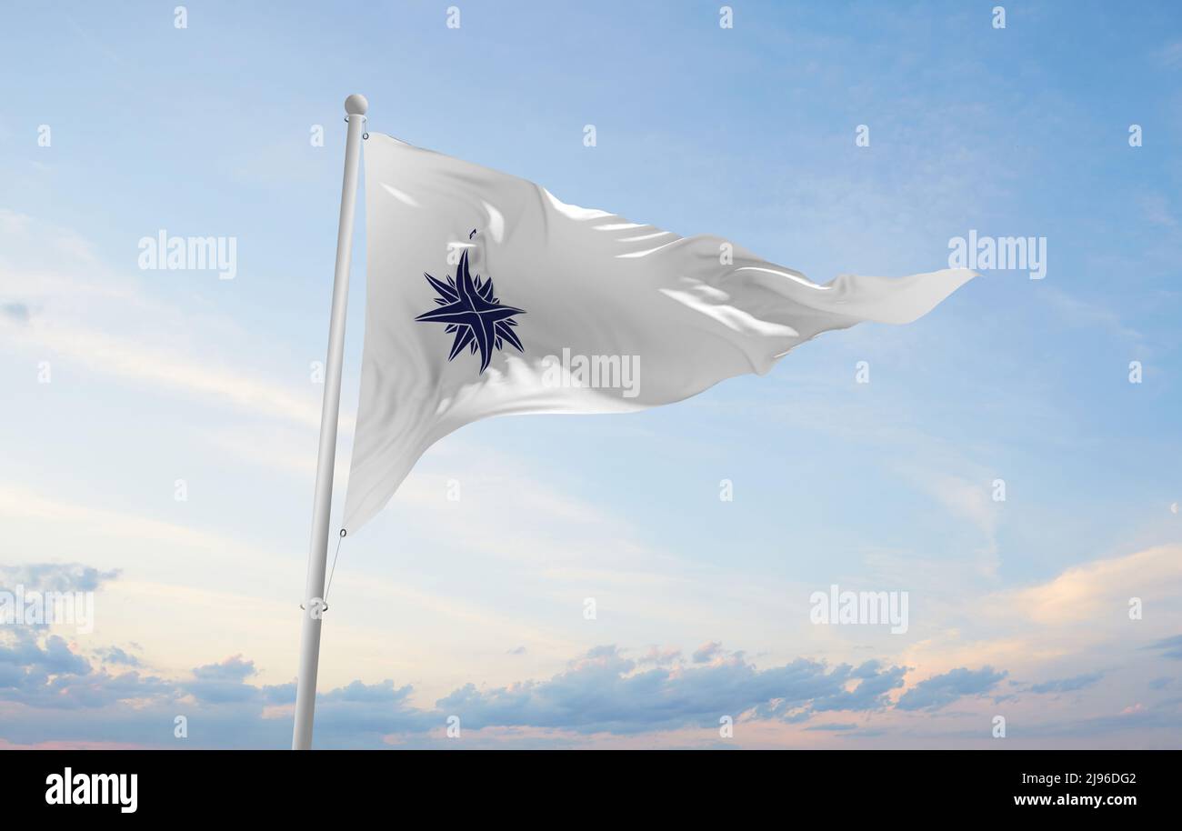 official flag of Commander Coast Guard , Japan at cloudy sky background ...