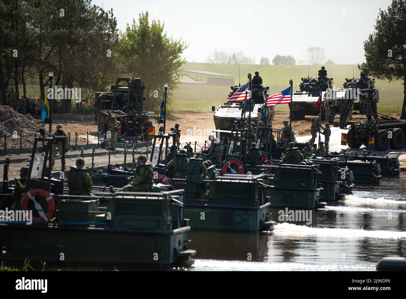 U.S. Soldiers and NATO allies complete a historic wet-gap crossing ...