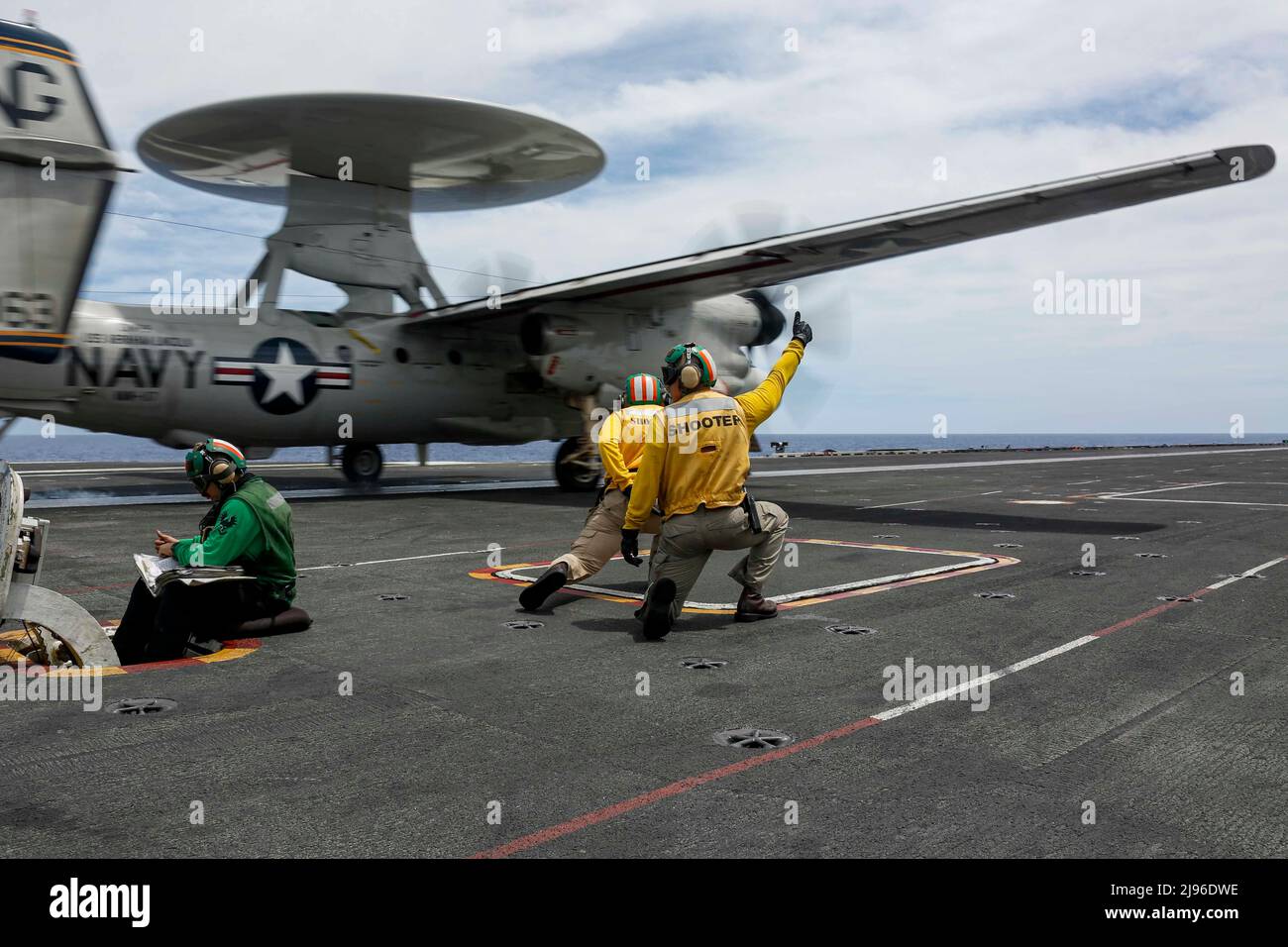 PHILIPPINE SEA (May 17, 2022) Sailors direct the launch of an E-2D ...