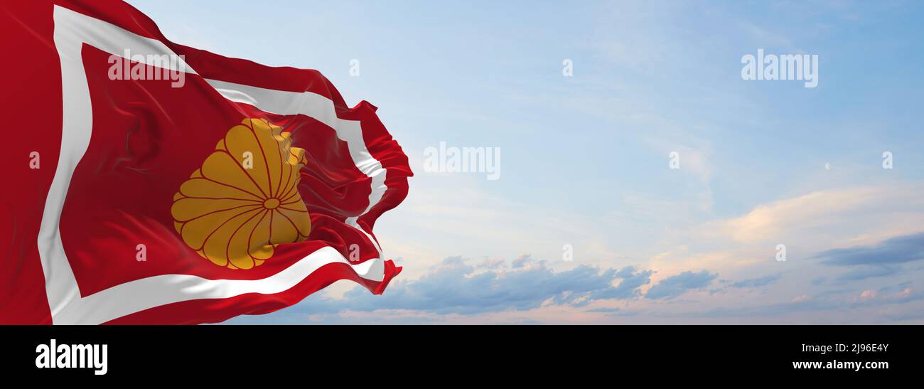 official flag of Heir Imperial Son and Imperial Grandson , Japan at cloudy sky background on ...