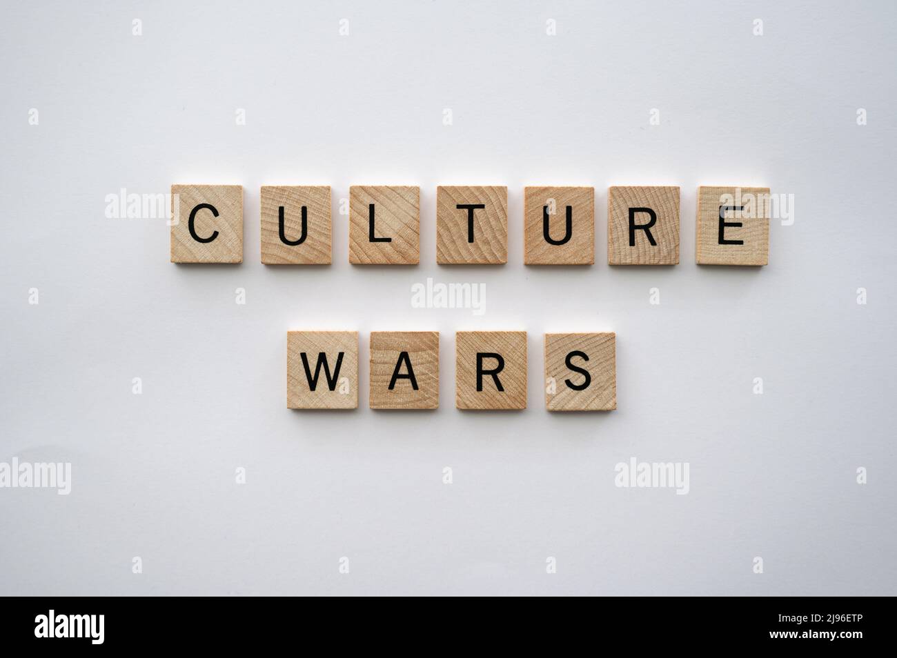 Culture wars concept with tile lettering Stock Photo - Alamy