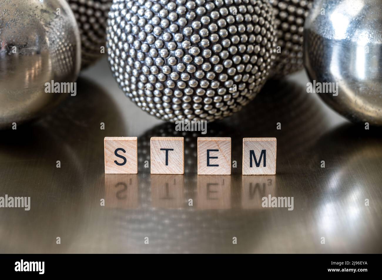 STEM - Science, Technology, Education and Math concept with tile ...